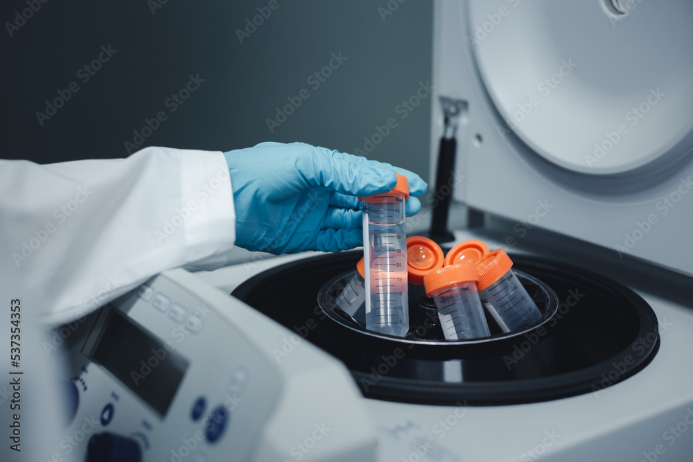 Researcher put the test tube of DNA extraction from Ecoli into a ...