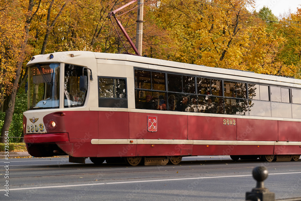 Sankt-Peterburg, RUSSIA - 12 october 2022 : red tram rides on rails ...