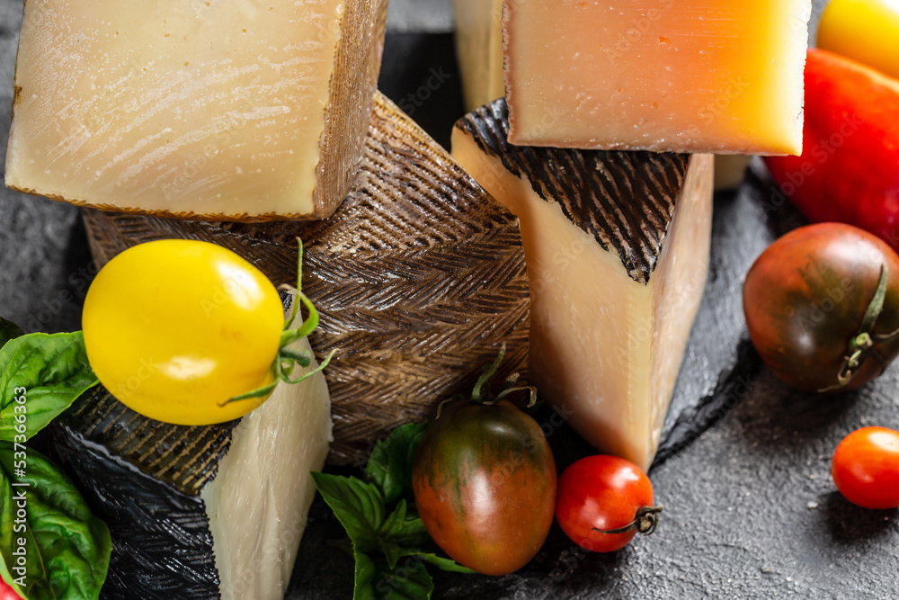 Cheese board of various types of soft and hard cheese. spanish manchego ...