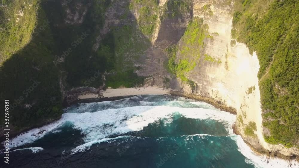 Dramatic aerial drone footage of the famous Kelingking beach, aka T Rex ...