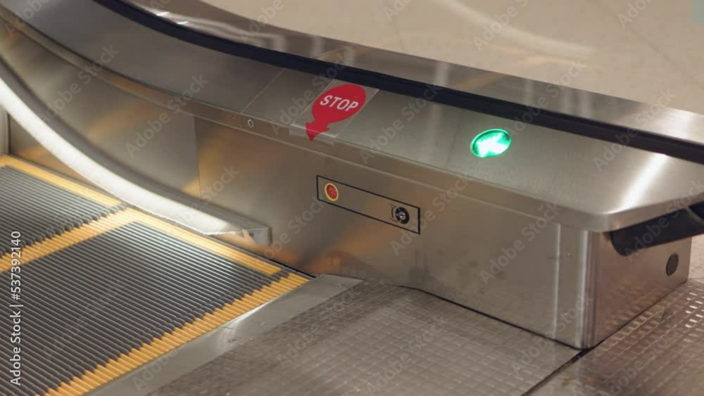 escalator stairs metal men legs in black shoes step on elevator stair ...