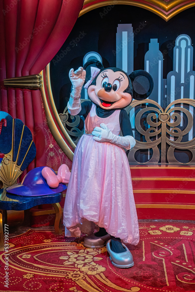 Minnie Mouse character in a pink dress Stock Photo | Adobe Stock