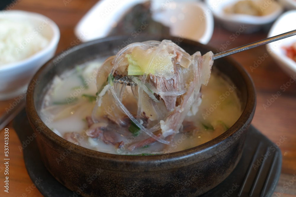 Korean dish made by boiling beef head and leg bones for a long time ...