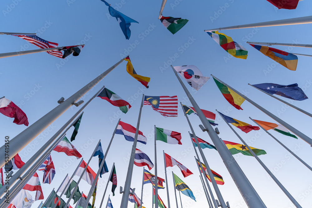 Flags of the different countries against the blue sky Stock Photo ...