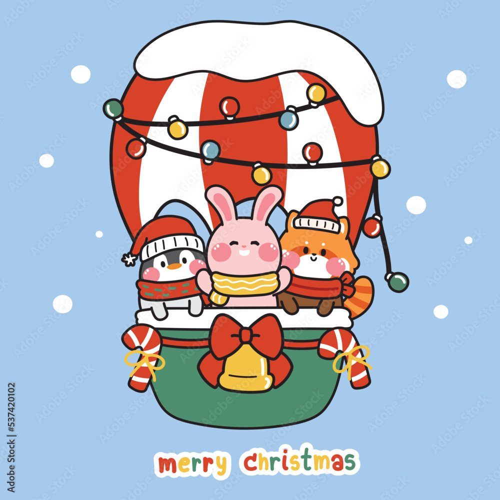 Cute animals stay in balloon with merry christmas text on sky ...