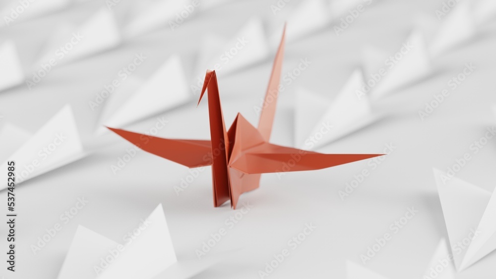 Origami of orange crane and many airplanes on white board under white ...