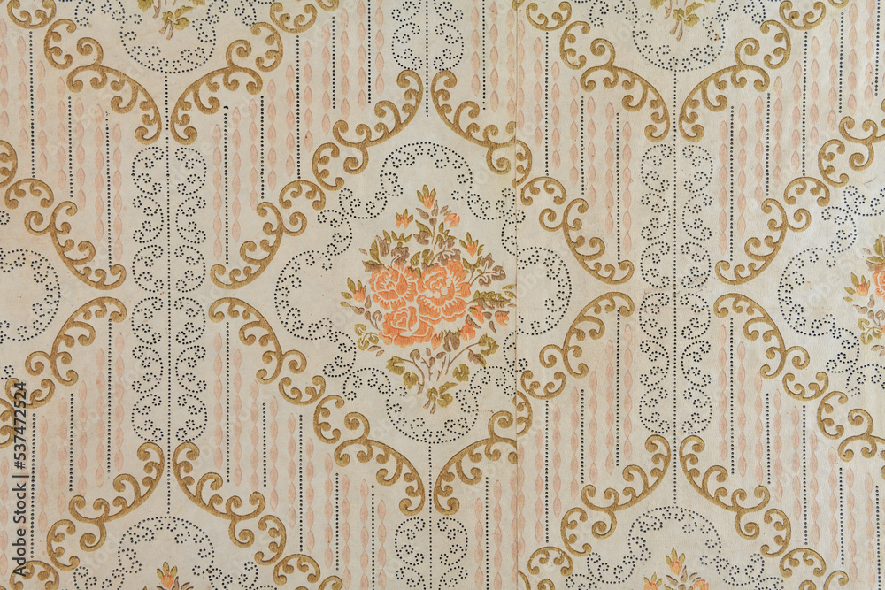 Old wallpaper on the wall. Old wallpaper for texture or background ...