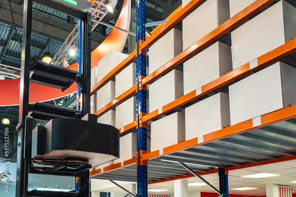 Automatic warehouse cart. Storage loader without people. Racks with ...