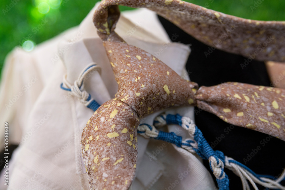 Concept of ultra-Orthodox Jewish clothes, a hat, a tsitzat, a tie ...