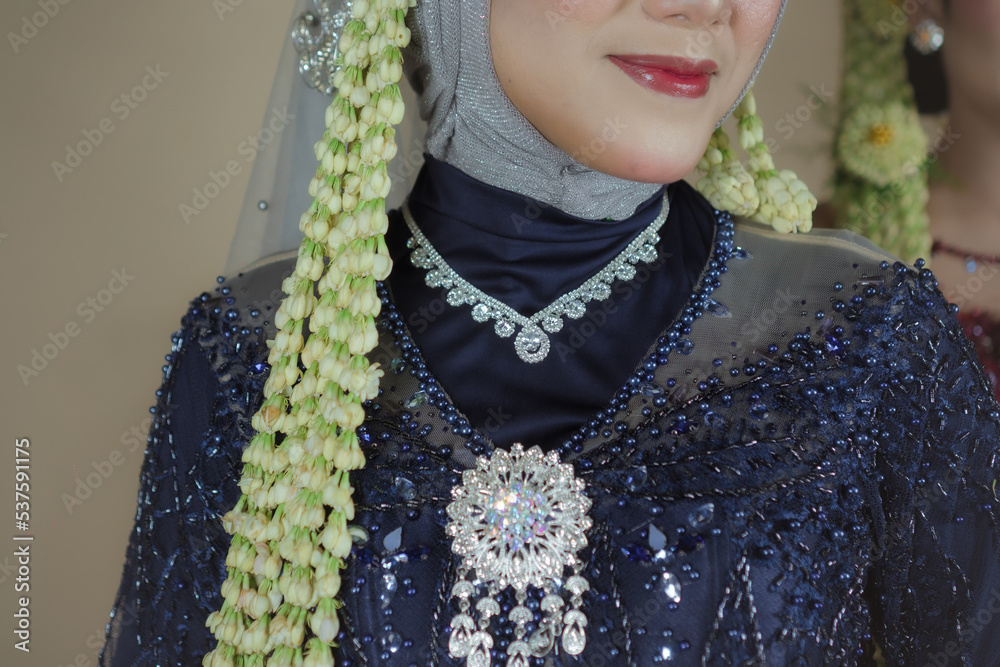 beautiful model, wearing hijab, Javanese Indonesian wedding dress in an ...