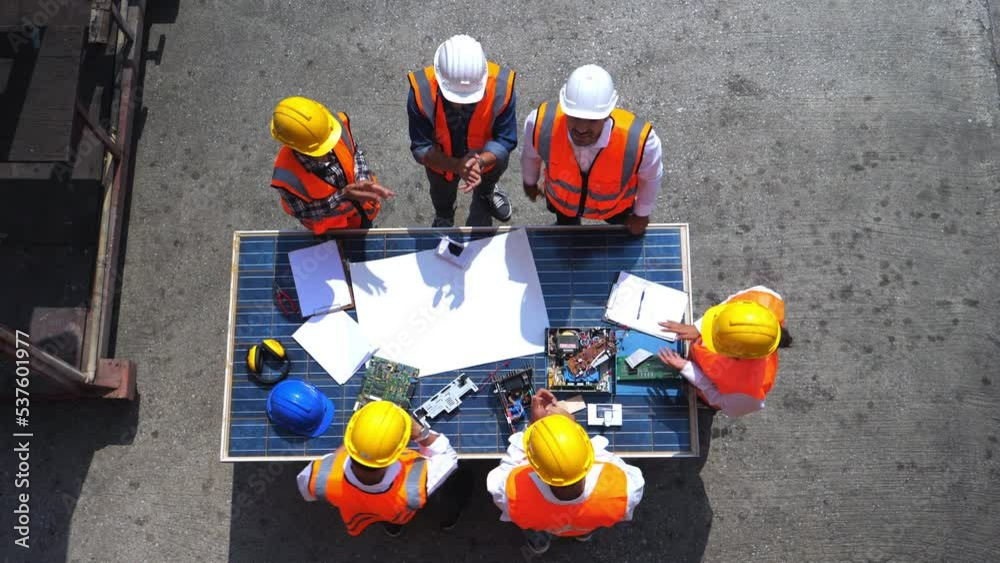 Clapping hands. Top view of architectural engineer working on solar ...