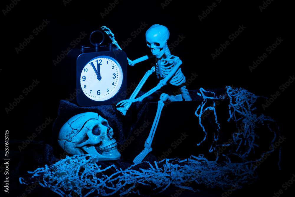 A skeleton waking up, crawling out of the grave and turning off the ...