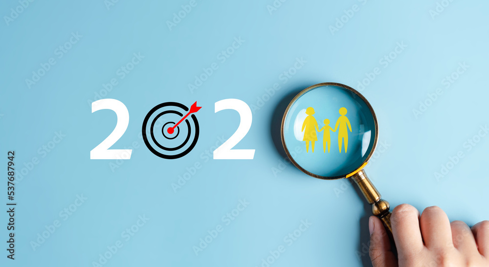 Happiness family on 2023 year concept. Magnifier focus to family icon ...