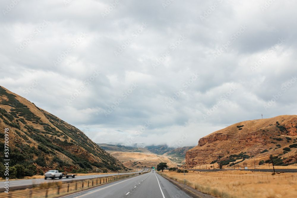 Highway among beautiful mountains. Beautiful road landscape with ...
