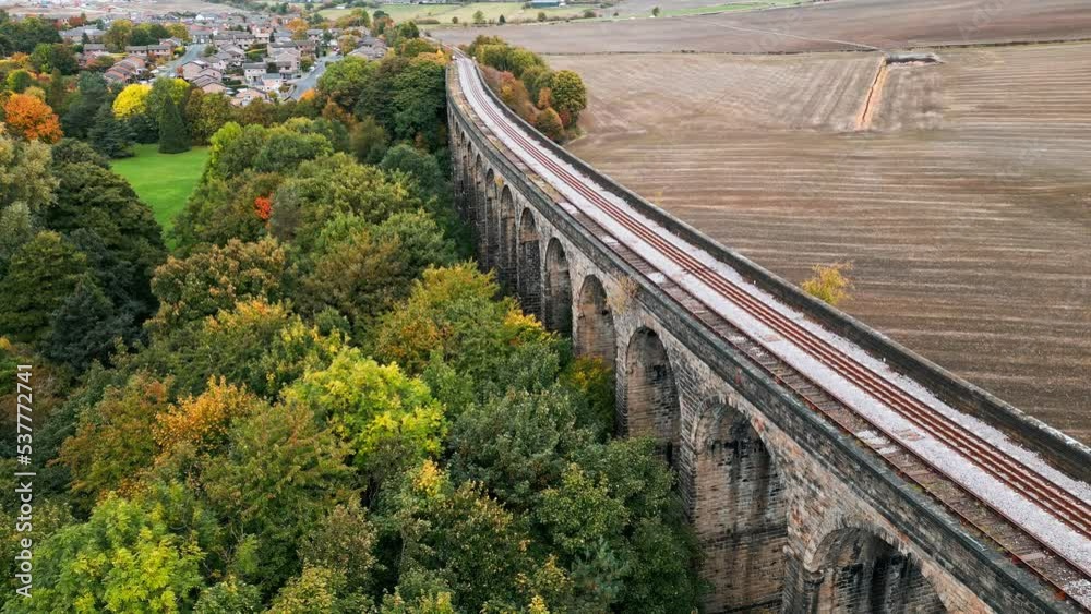 Drone aerial video footage of the Penistone Viaduct a curved railway ...