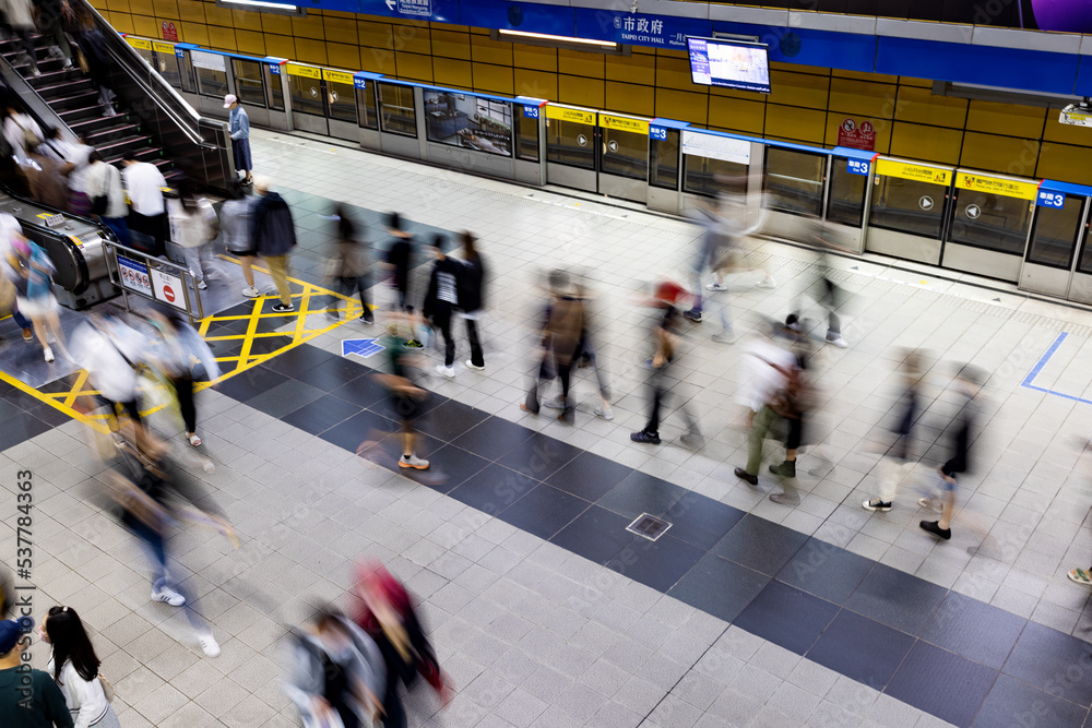 TAIPEI,TAIWAN - JUNE 14 2022: Passengers waiting and ride the MRT, on ...