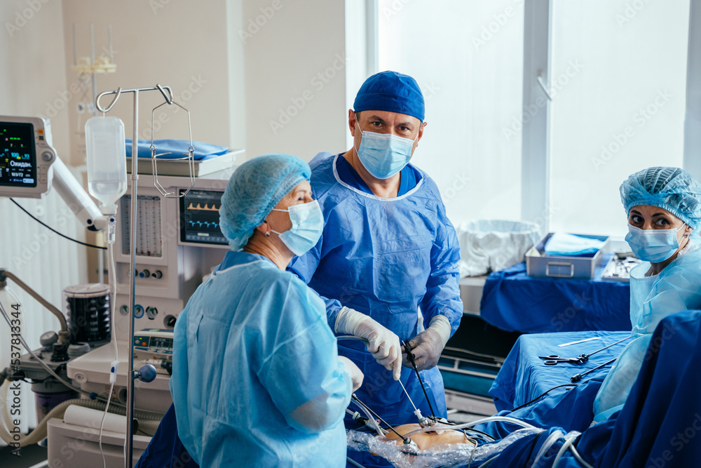 Minimally invasive surgery. Medical background. Coordinated work of the ...