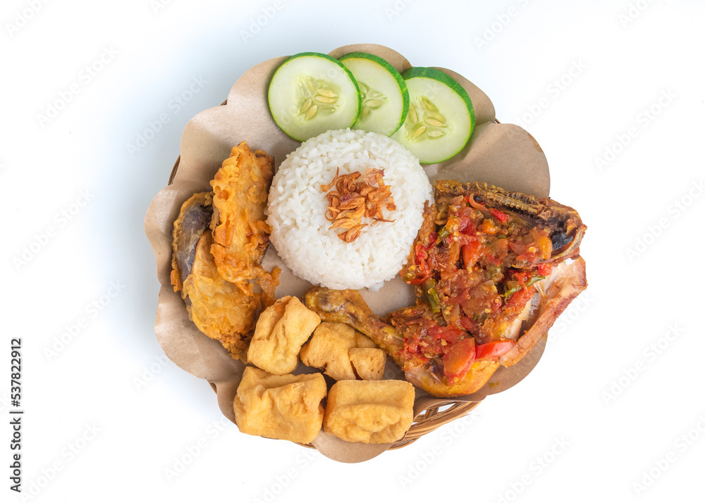 Ayam penyet or smashed fried chicken cover with spicy sambal served ...
