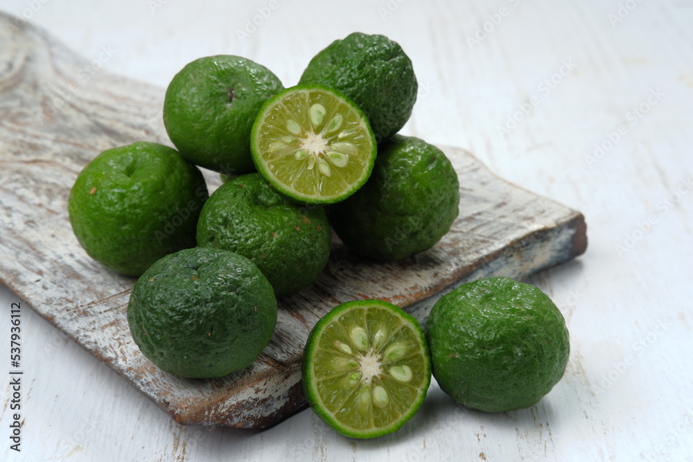 Jeruk limo or limes ,Green in color and rough fruit skin. Fragrant ...
