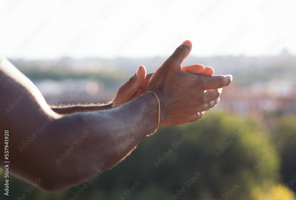 Black man on balcony clapping during the COVID-19 pandemic Stock Photo ...