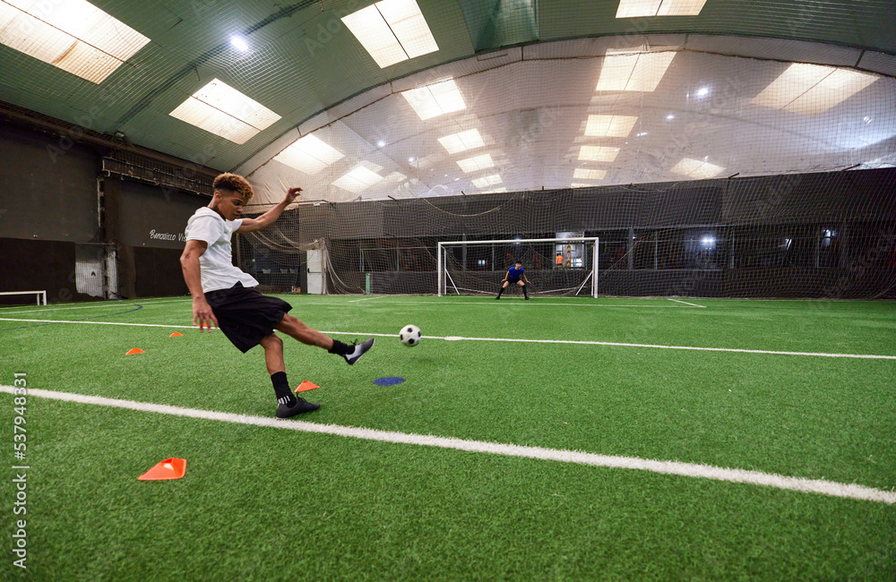 Teen football players playing ball Stock Photo | Adobe Stock