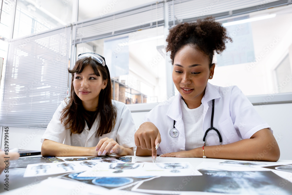 Female medical student study in class room. medical students studying ...