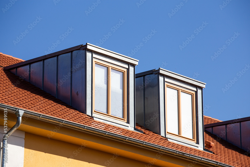 Dachgauben mit Edelstahlverkleidung Stock-Foto | Adobe Stock