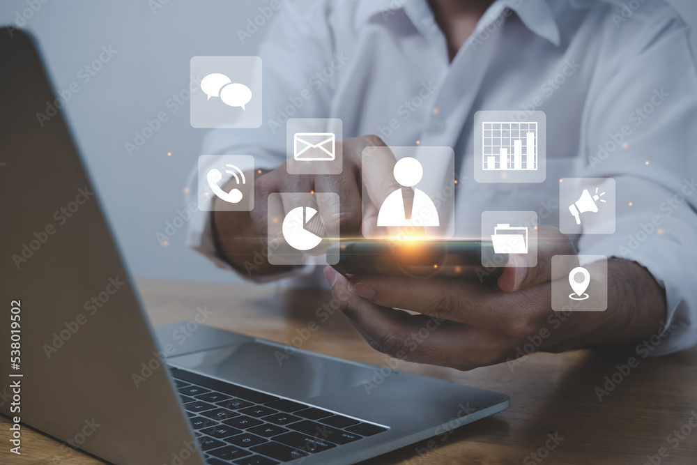 Contact Us. businessman hand touching on mobile smart phone and ...