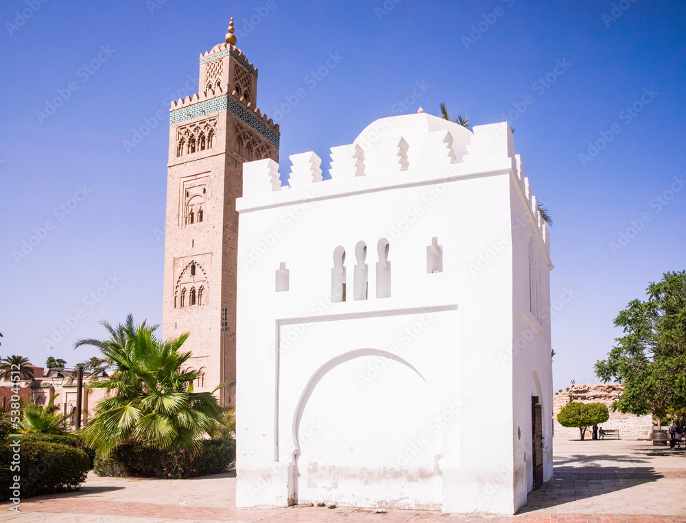 Arab white booth next to the Koutoubia mosque is the iconic monument of ...