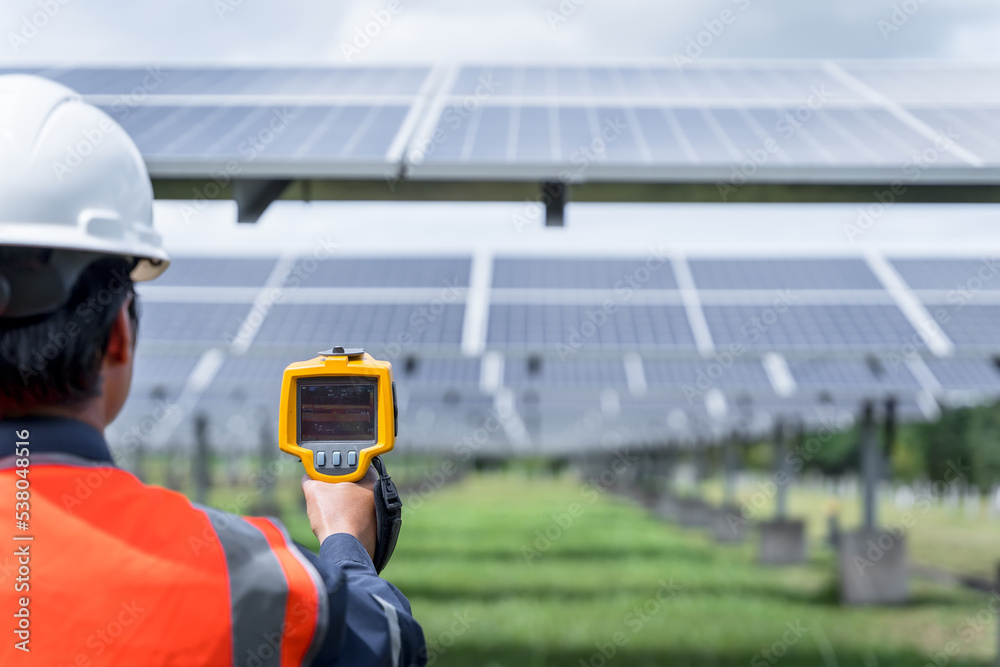 The technician takes the Thermoscan(thermal image camera) scan to the ...