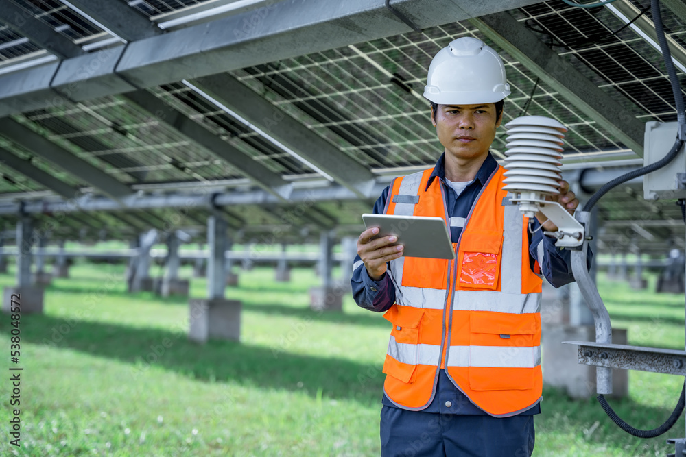 Technicians are checking the operation of the solar power plant ...