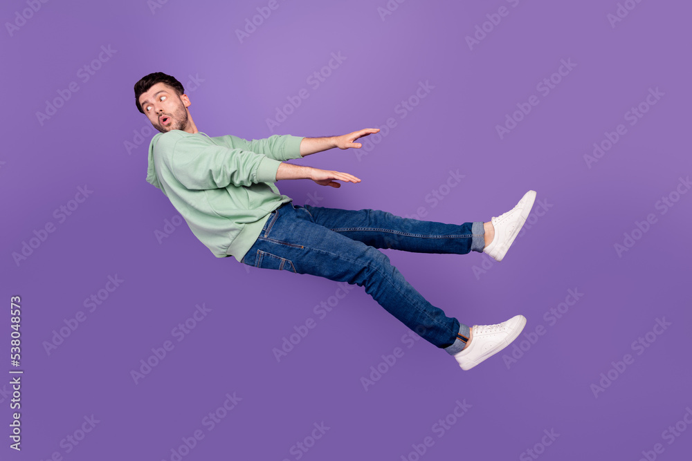 Full body photo of attractive young man wind blow away look back ...