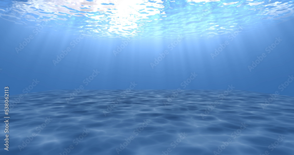 Rays of sunlight shining from above penetrate deep clear blue water ...