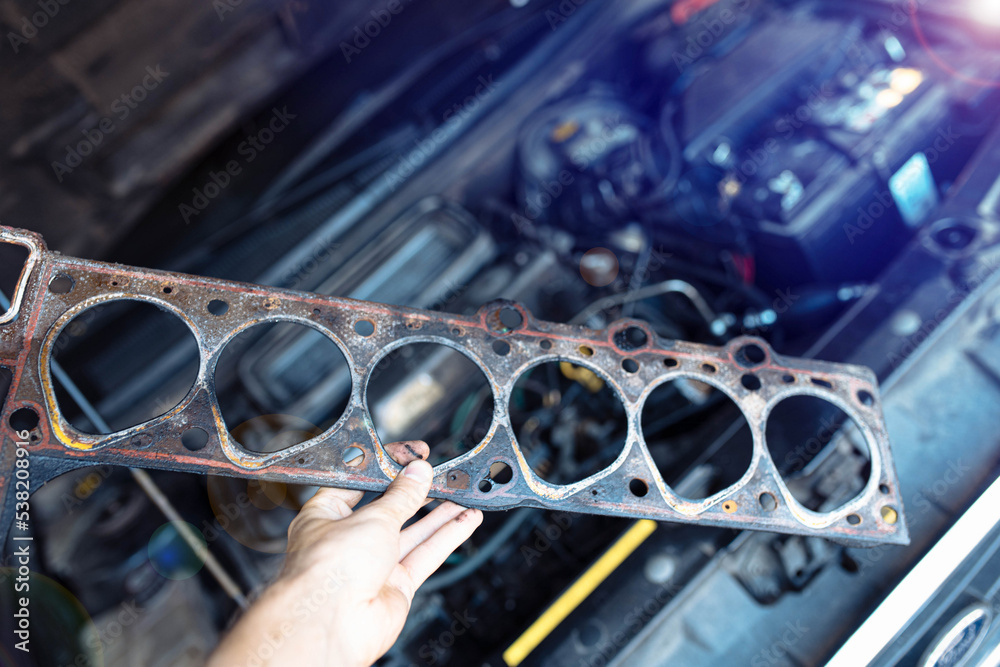 Photo & Art Print concept of replacing the cylinder head gasket on a ...