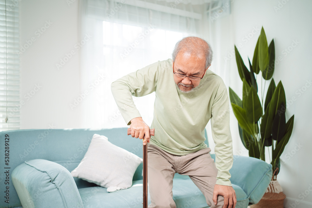 Asian Senior elderly old man disabled patient walking slowly his use ...