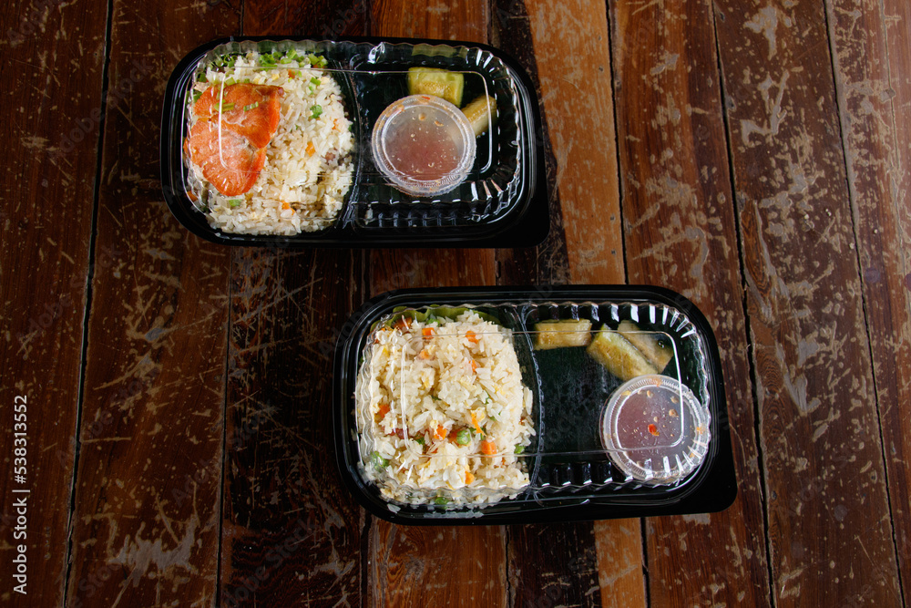 Top view of traditional khmer food packed in single use plastic for ...