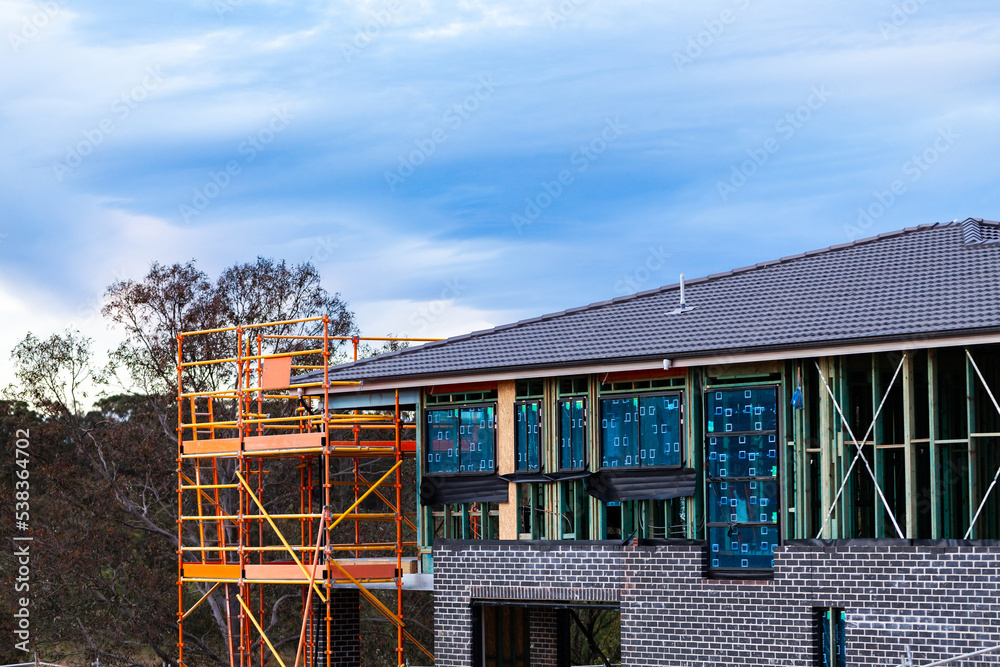 Scaffolding up around double storey new house build on construction ...