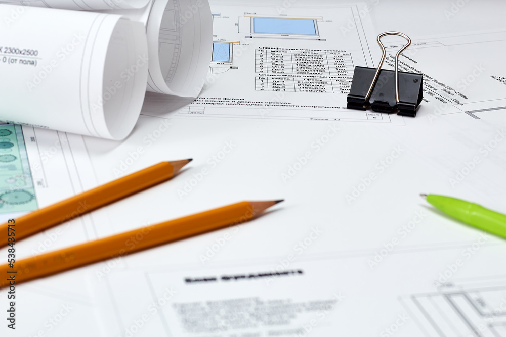 Working tools and drawings of the designer on a white background ...