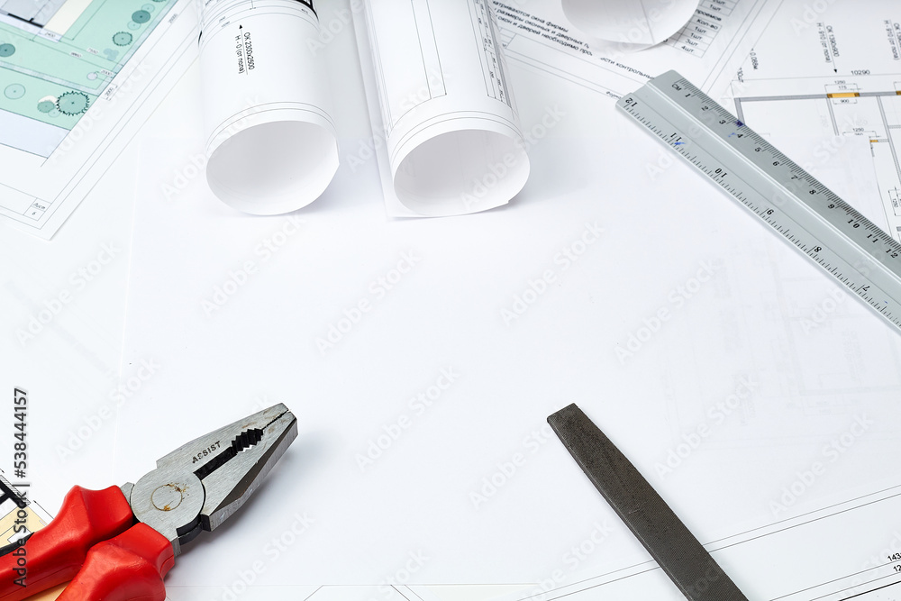 Working tools and drawings of the designer on a white background ...