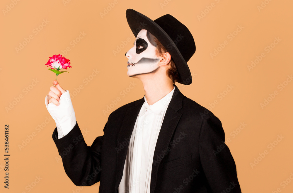 Portrait of spooky handsome guy made makeup for Halloween event, has ...