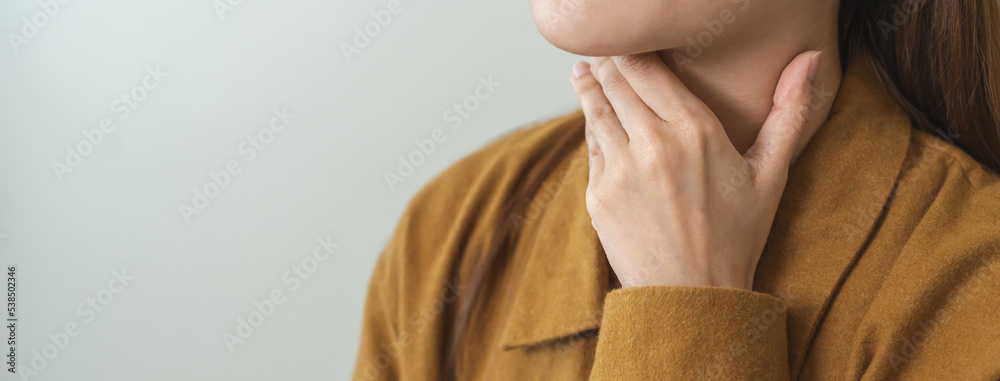 Sickness in inflaming asian young woman, girl use hand check self touch ...