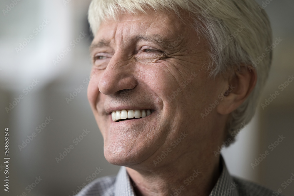 Cropped shot, close up, happy face of older man having wrinkled skin ...