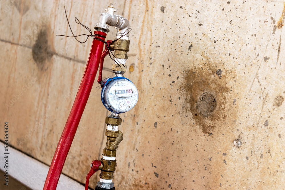 Water meter at a construction site. Provision and accounting of water ...