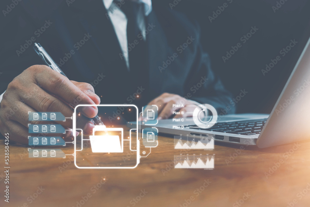 document management system concept, Businessman pointing folder and ...