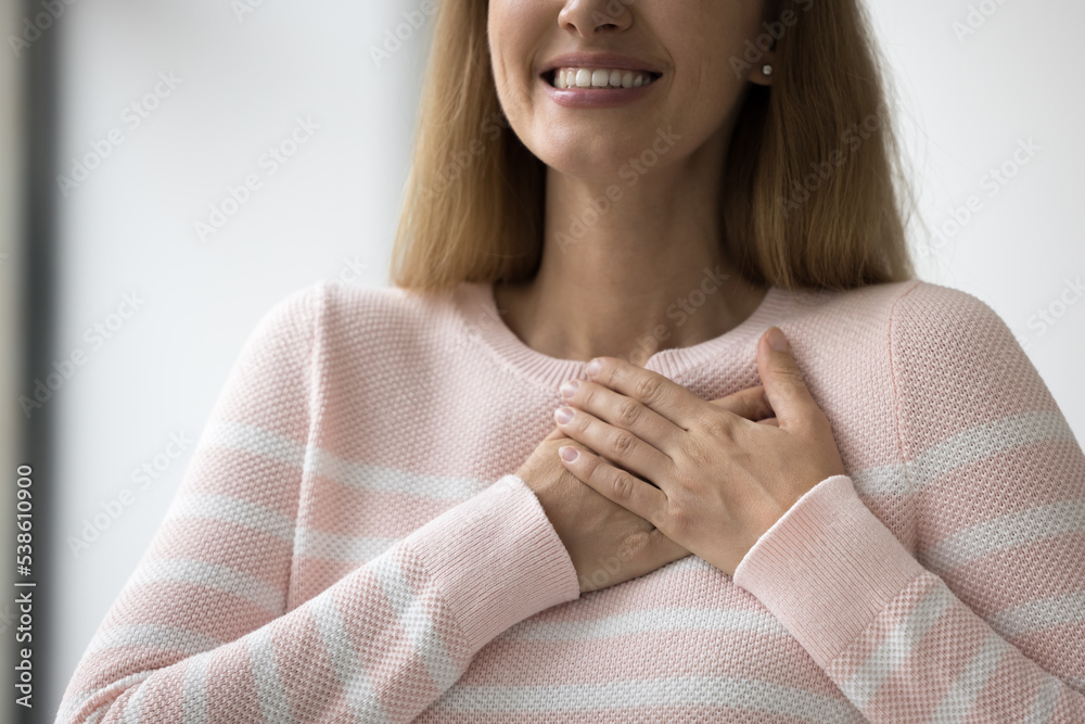 Sincere woman thanks the higher powers for miracle, feelings of relief ...