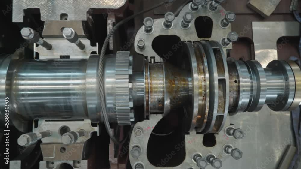 Big steam turbine detail shown from above. The metal components are ...