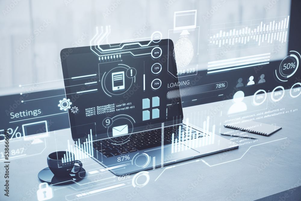 Close up of desktop with laptop, coffee cup and creative glowing ...