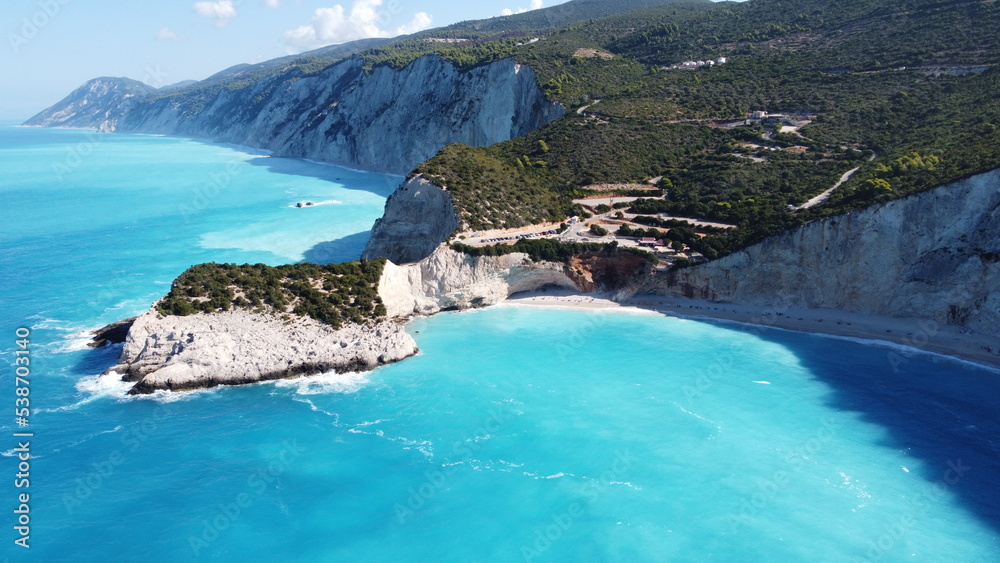 The beautiful turquoise blue color of the Ionian Sea that surrounds the ...
