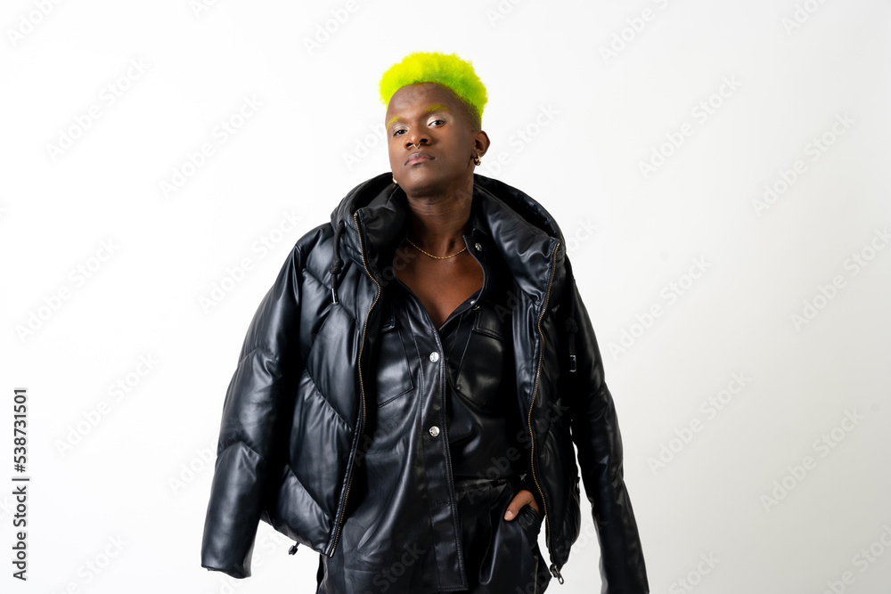 Black ethnic man in studio with white background, LGTBI concept, posed ...