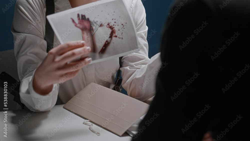 Interrogation, suspect in handcuffs screams and emotionally denies FBI ...